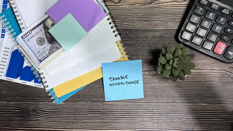 Concept of Taxable Inheritance Write on Sticky Notes Isolated on Wooden ...