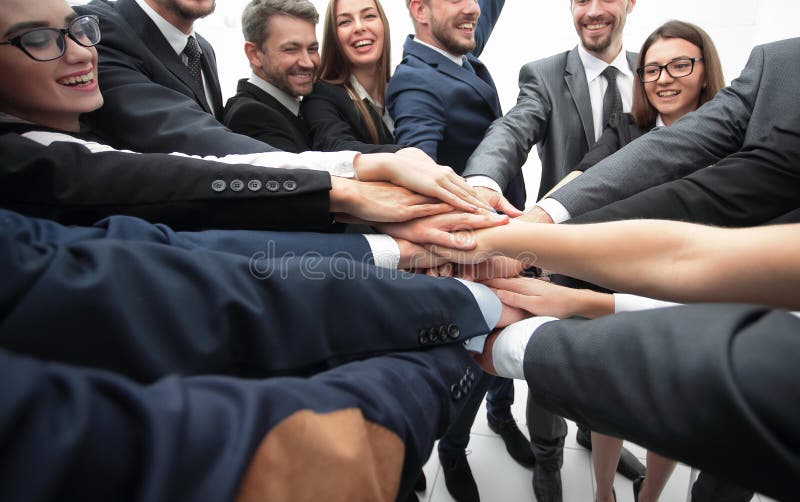 Large Business Team Standing with Folded Hands Together Stock Image ...