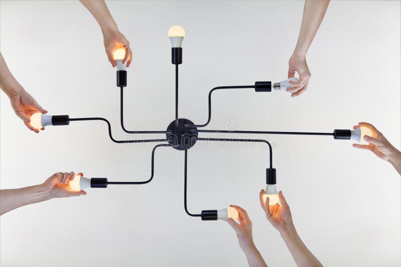 Colleagues Working Out Together for Install Led Bulb in Lamphol Stock ...