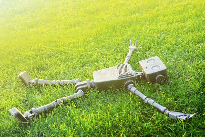 Happy Humanoid Robot Lies on the Autumn Grass Stock Image - Image of ...