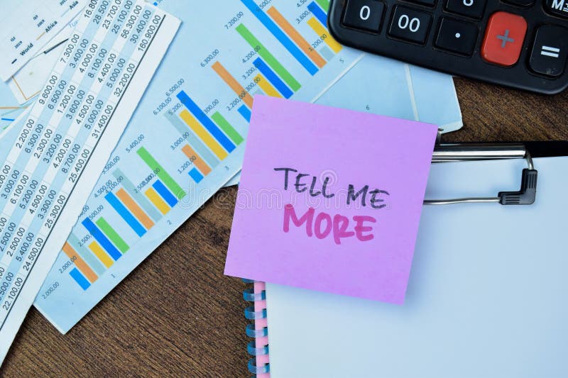 Concept of Tell Me More Write on Sticky Notes Isolated on Wooden Table ...