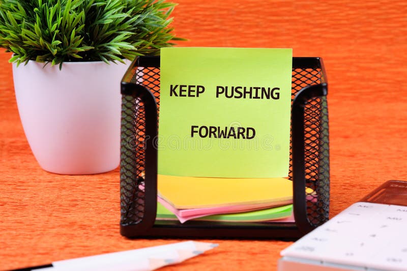 Concept Text KEEP PUSHING FORWARD Written on Colorful Stickers in a ...