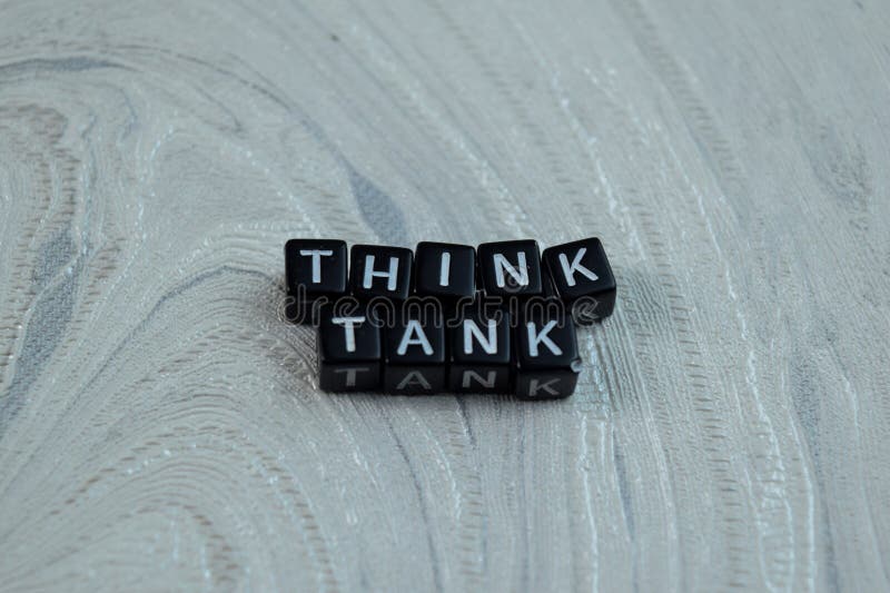Concept of Think Tank Written on Wooden Blocks. Cross Processed Image ...