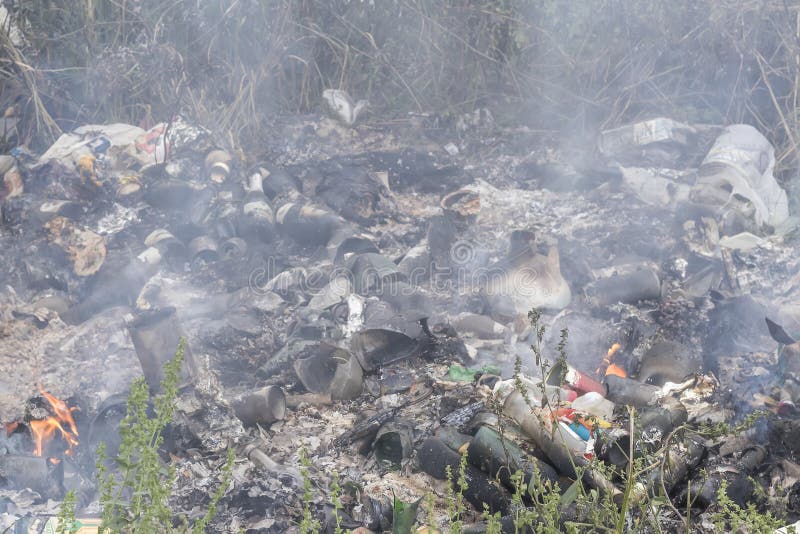 Burning of garbage stock image. Image of environment - 185498837