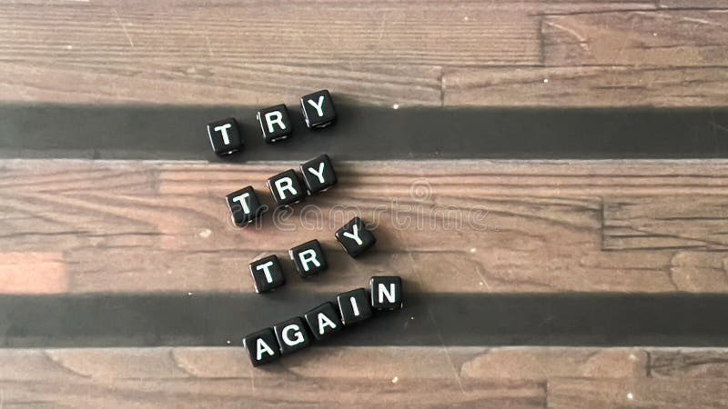 Concept of Try Try Try Again Written on Wooden Blocks. Cross Processed ...