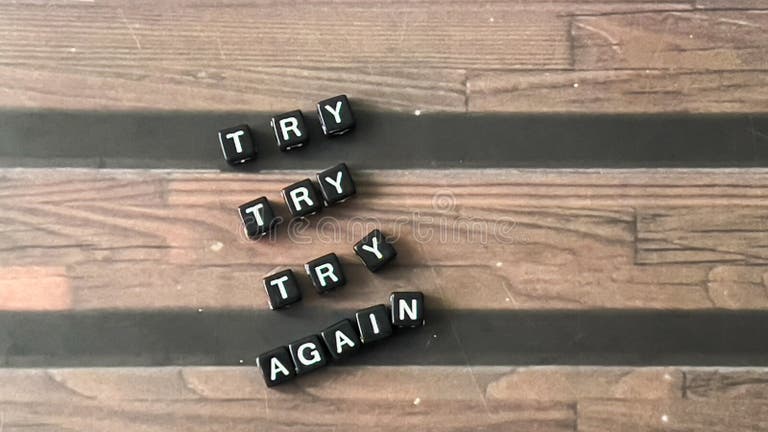 Concept of Try Try Try Again Written on Wooden Blocks. Cross Processed ...