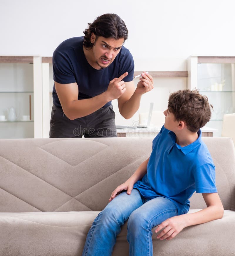 Concept of Underage Smoking with Young Boy and Family Stock Photo ...