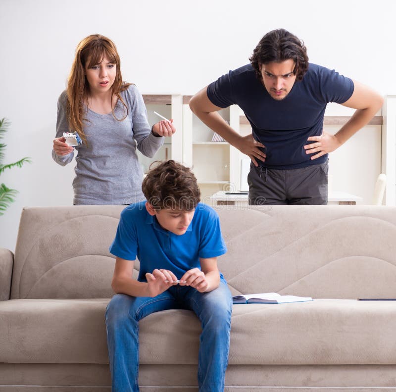 Concept of Underage Smoking with Young Boy and Family Stock Photo ...