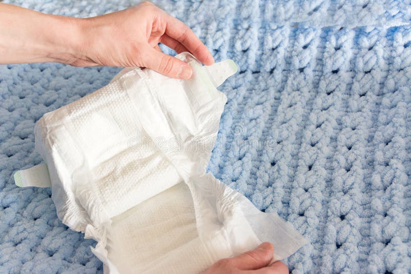 The Concept of Using Diapers for Babies Stock Photo - Image of care ...