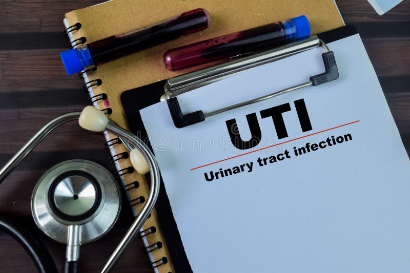 Concept of UTI - Urinary Tract Infection Write on Paperwork Isolated on ...