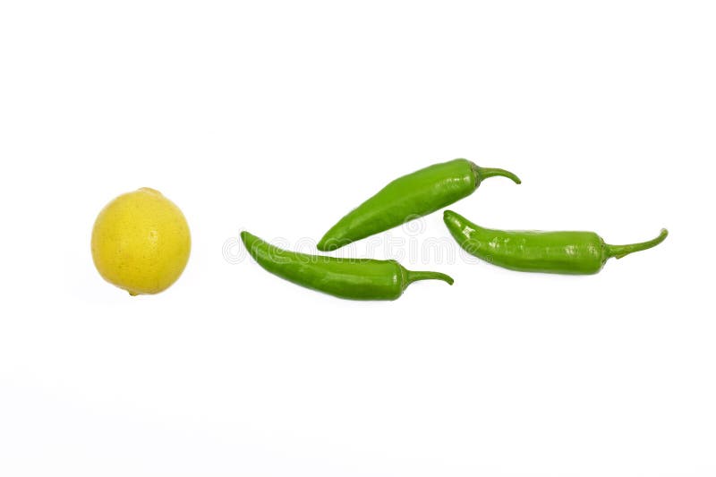 Concept of Vegetables Lemon and Chilli on it White Backgrounds Stock ...