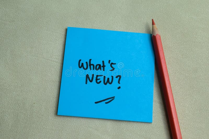 Concept Of What S New Write On Sticky Notes Isolated On Wooden Table