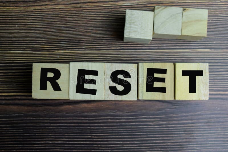 Concept of the Wooden Cubes with the Word Reset on Wooden Background Stock Photo - Image of lock ...