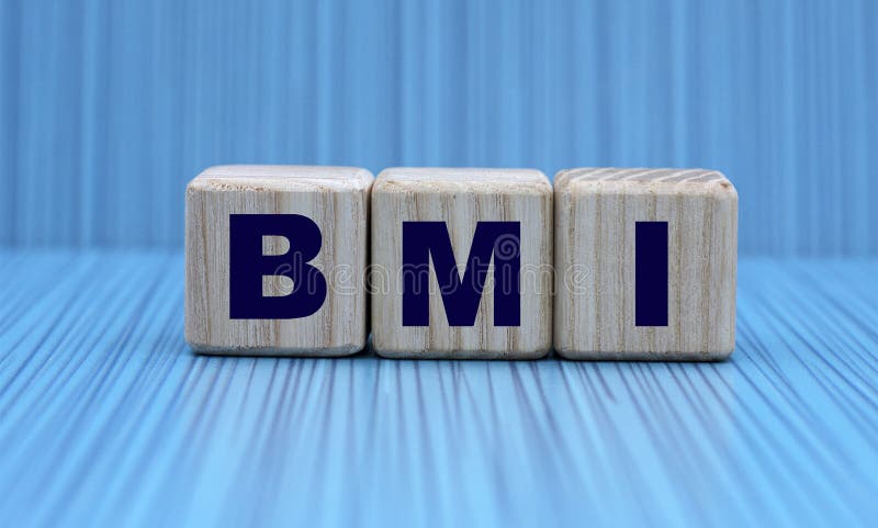 The Concept of the Word BMI on Cubes on a Blue Background in a Stripe ...