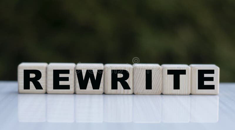 The Concept of the Word REWRITE on Cubes on a Beautiful Green ...