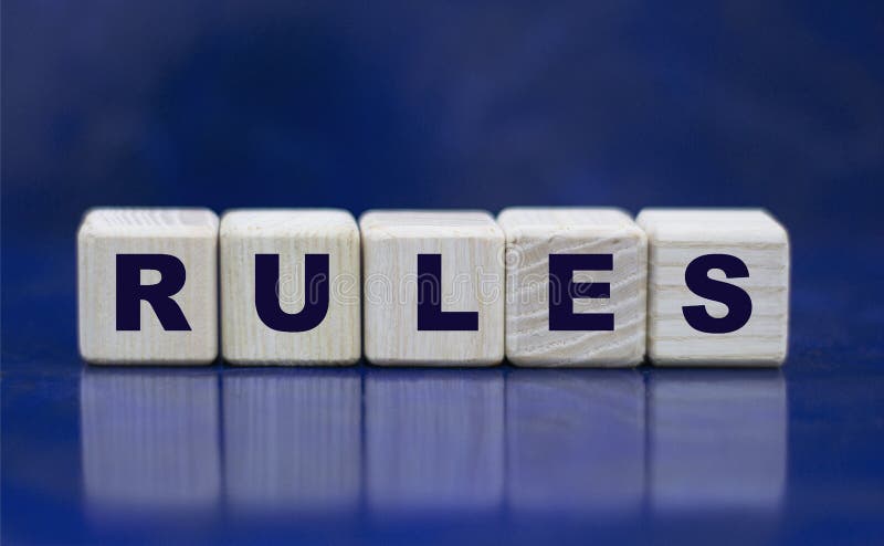 Concept Word Rules on Cubes on a Blue Background Stock Photo - Image of ...