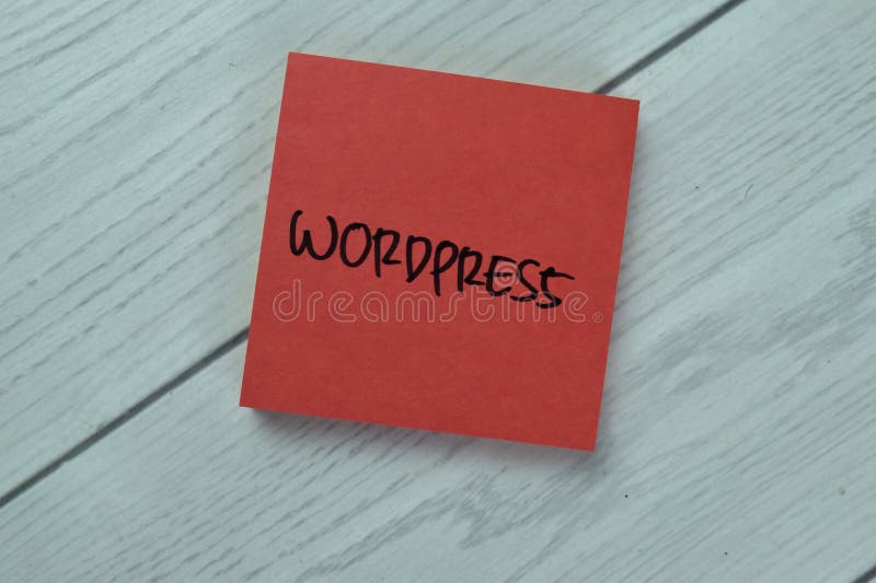 Concept Of Wordpress Write On Sticky Notes Isolated On Wooden Table