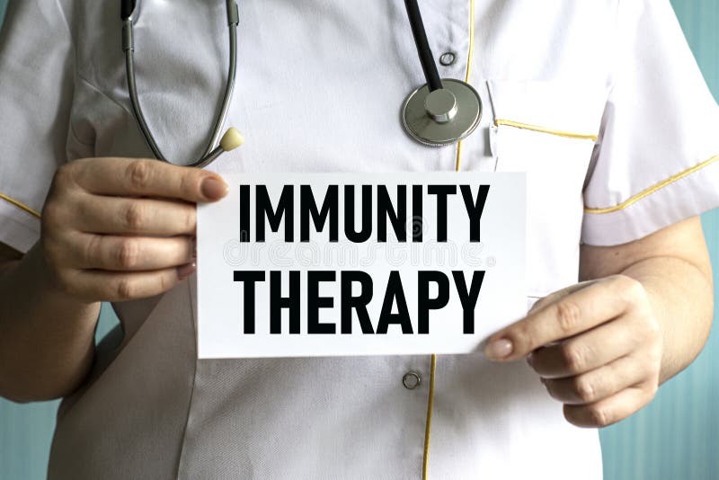 Concept Words IMMUNITY THERAPY in the Hands of a Doctor Stock Image ...