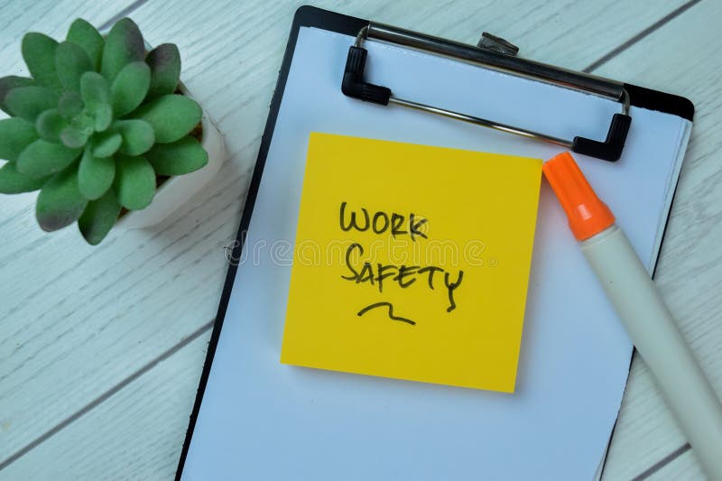 Concept of Work Safety Write on Sticky Notes Isolated on Wooden Table ...