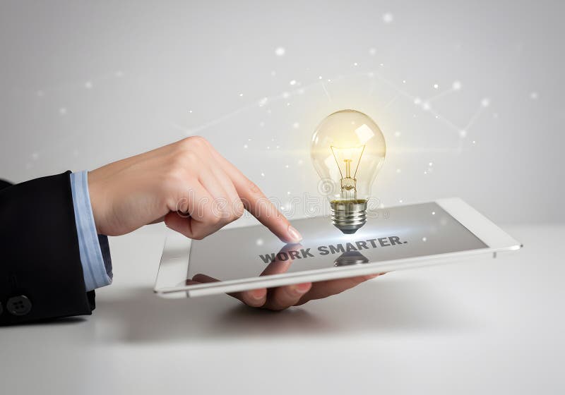 Work Smarter Concept with Lightbulb and Tablet for Business ...