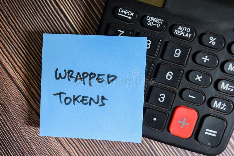 Concept of Wrapped Tokens Write on Sticky Notes Isolated on Wooden ...