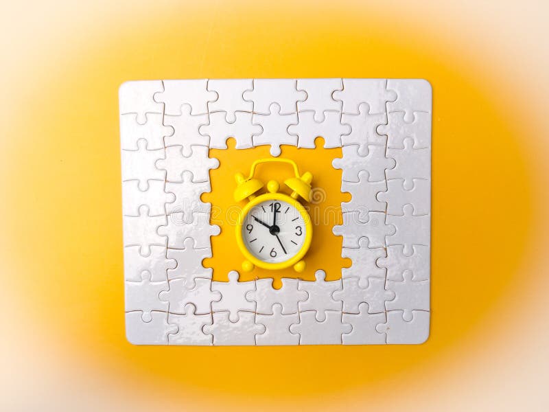 Concept Yellow Alarm Clock and Puzzle Stock Photo - Image of analysis ...