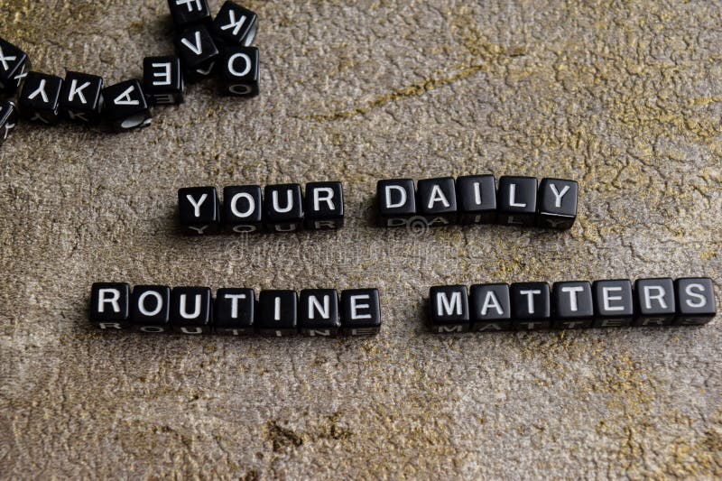 Concept of Your daily Routine Matters Written on Wooden Blocks. Cross ...