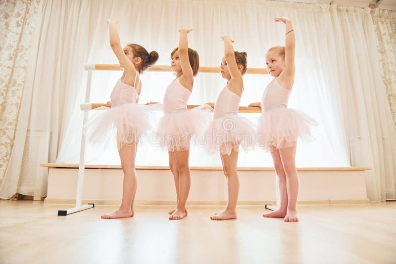 Conception of Art. Little Ballerinas Preparing for Performance Stock ...