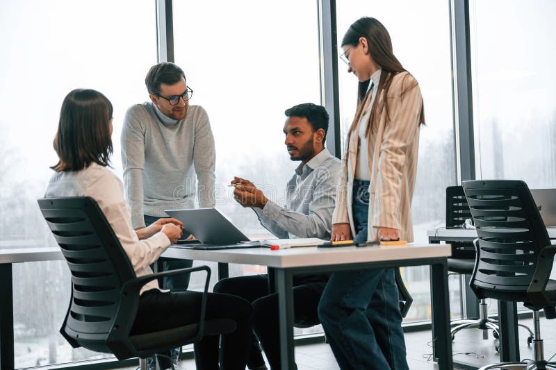 Conception of Brainstorming. Four People are Working in the Office ...