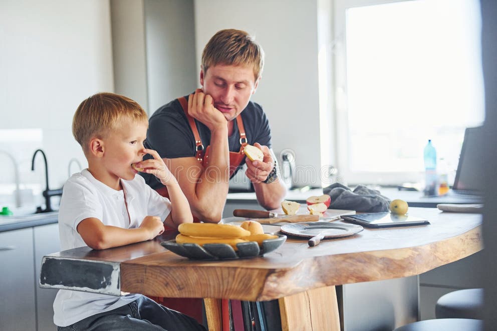 Conception of Culinary. Father and Son is Indoors at Home Together Stock Image - Image of ...