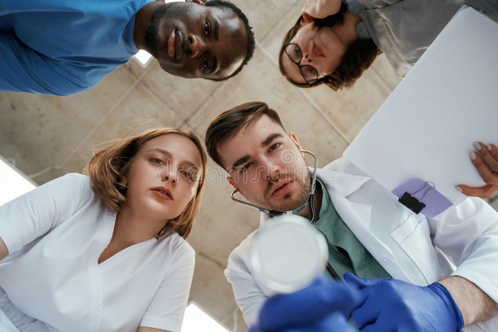 Conception of Curiosity. View from Below of Group of Doctors Stock ...