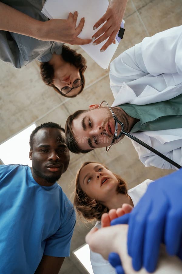 Conception of Curiosity. View from Below of Group of Doctors Stock ...