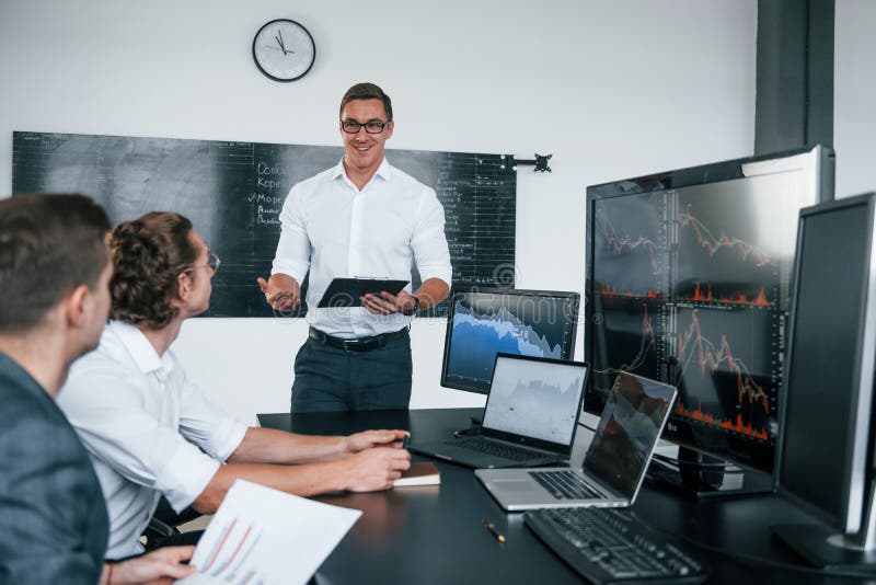 Conception of Teamwork. Team of Stockbrokers Works in Modern Office ...