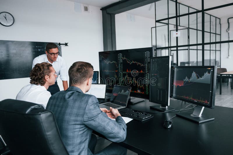 Conception of Teamwork. Team of Stockbrokers Works in Modern Office ...