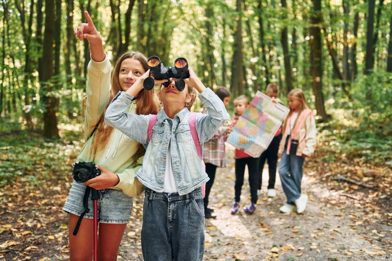 Conception of Tourism. Kids in Green Forest at Summer Daytime Together ...
