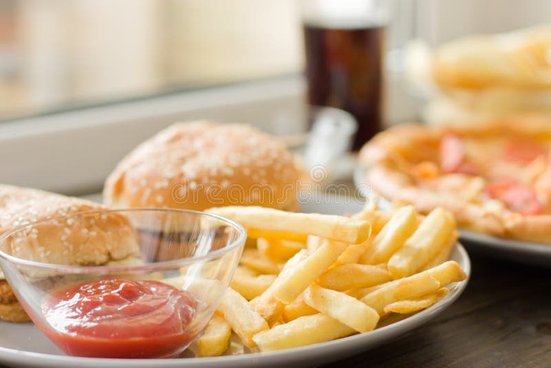 Concepto Malsano Comida Malsana Foto de archivo - Imagen de queso ...