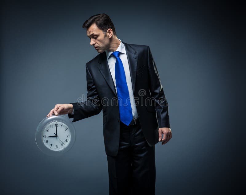 Dropping a clock in toilet stock photo. Image of timer - 9457034