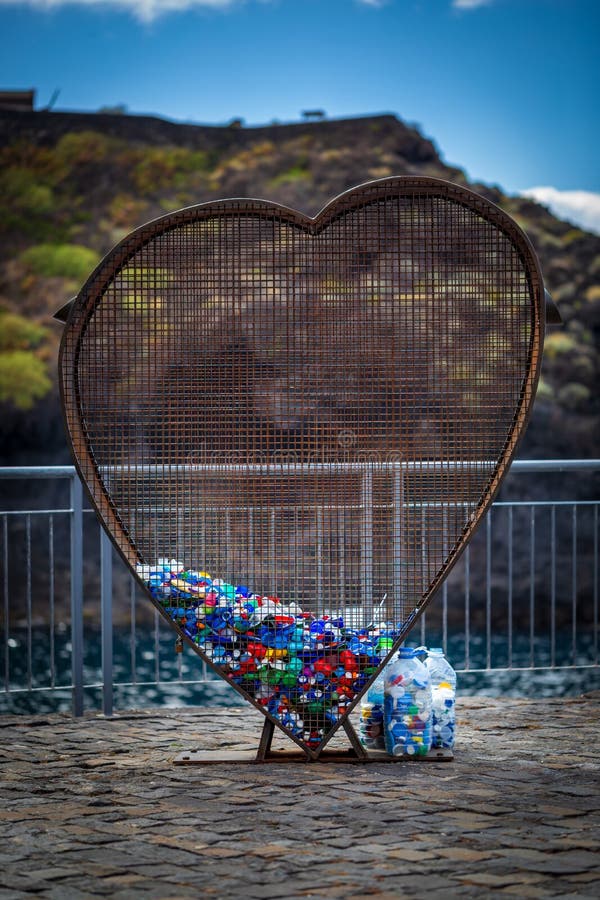 Conceptual Garbage Can Heart-shaped for Plastic Nuts. Stock Image ...
