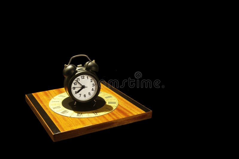 Past and Future Concept with an Alarm Clock on a Vintage Clock Dial ...