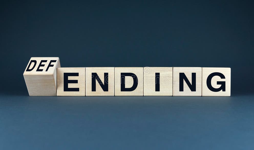 A Conceptual Image Featuring Wooden Blocks Spelling DEFENDING and ...