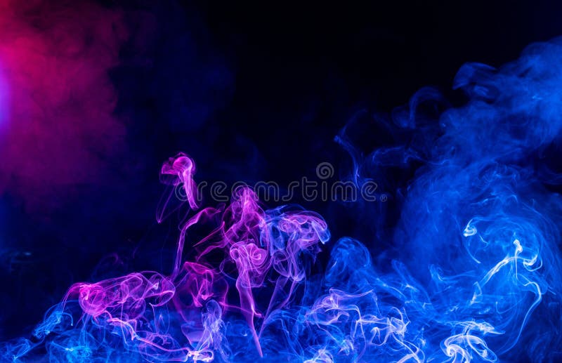 Multi-colored Smoke on a Dark Background. Selective Focus Stock Photo ...