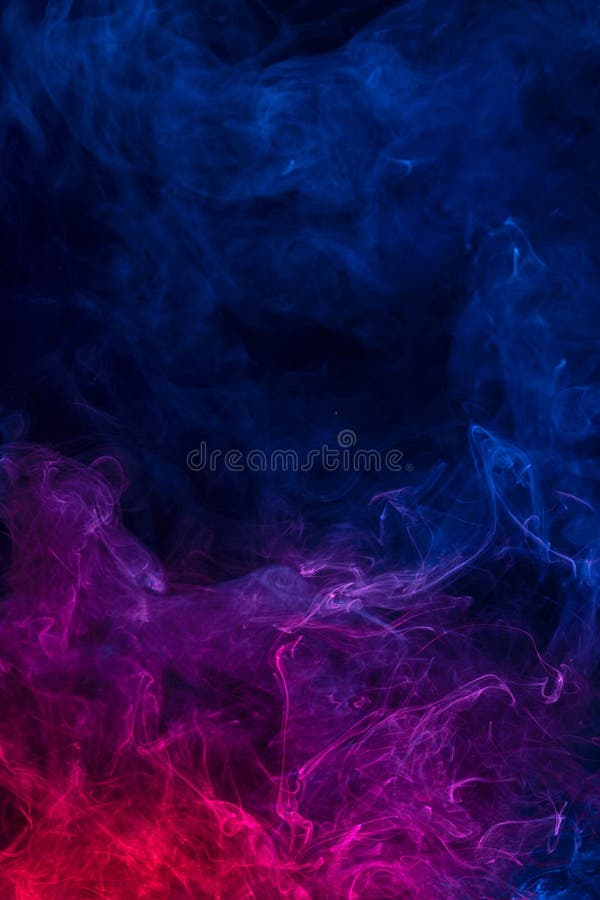 Multi-colored Smoke on a Dark Background. Selective Focus Stock Photo ...