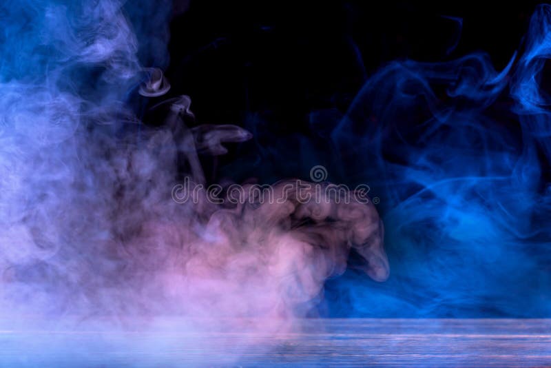 Multi-colored Smoke on a Dark Background. Selective Focus Stock Photo ...