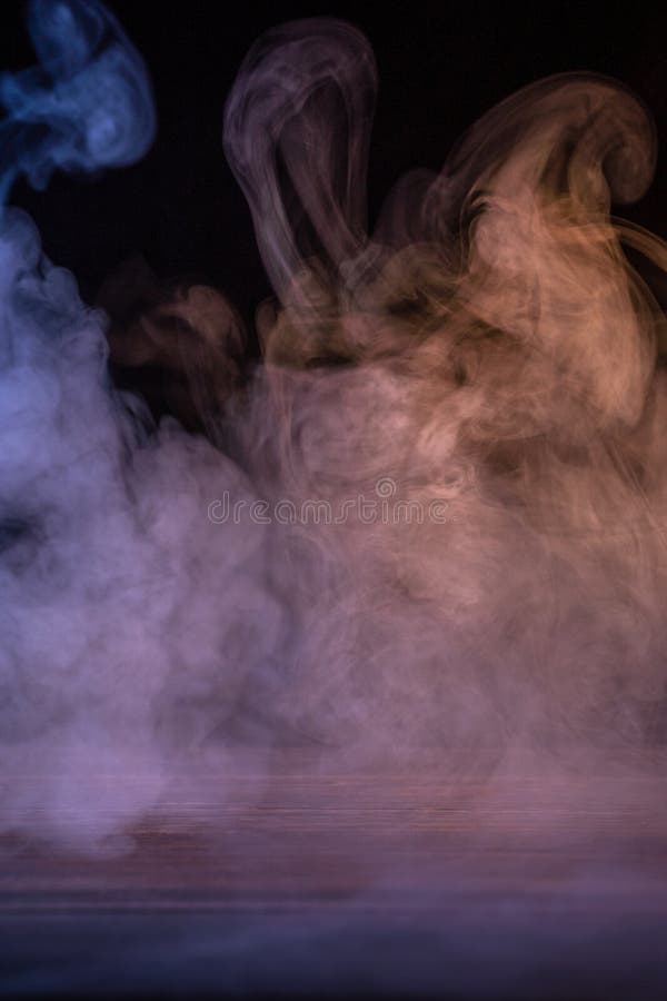 Multi-colored Smoke on a Dark Background. Selective Focus Stock Photo ...