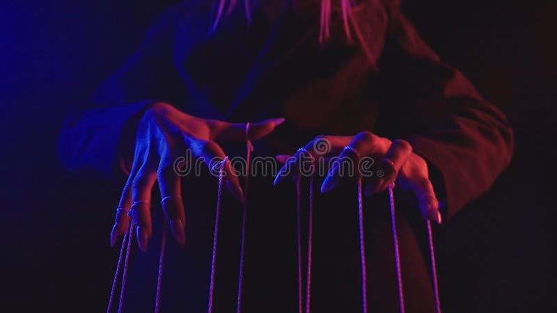Conceptual Image of Mysterious Hands Controlling Strings Stock Photo ...