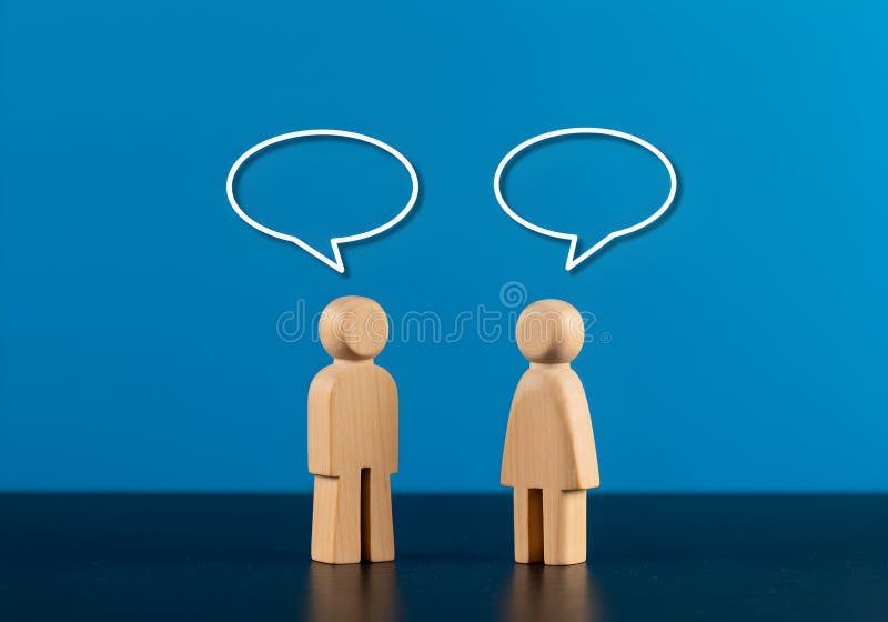 Communication Concept with Wooden Figures and Speech Bubbles on Blue ...