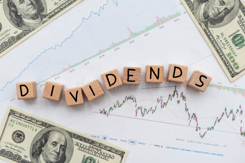 Conceptual Image of the Word Dividend on Letter Cube with Stock Graph ...