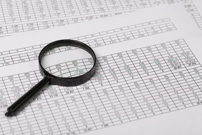 Conceptual Magnifying Glass on Reports with Figures Stock Image - Image ...