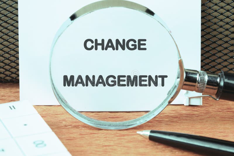 The Conceptual Phrase CHANGE MANAGEMENT on a White Sheet through a ...
