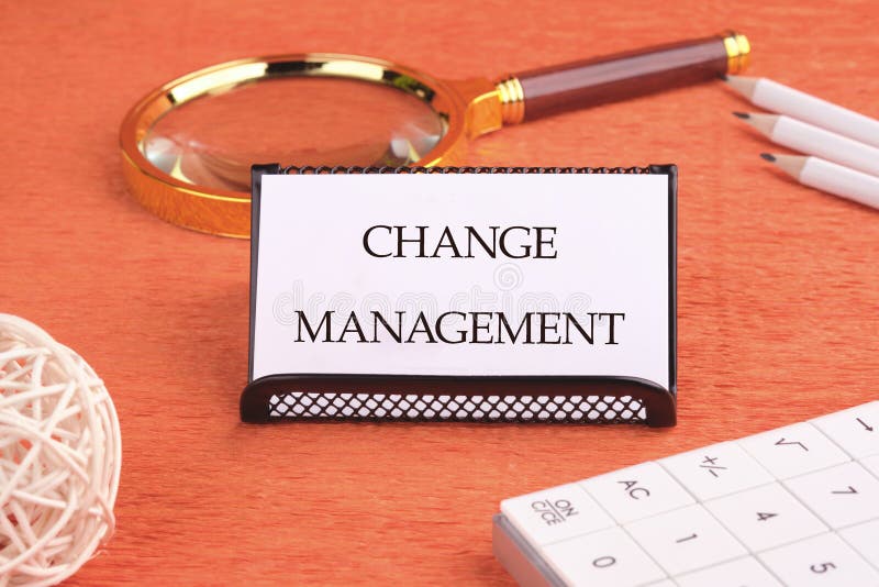 The Conceptual Phrase CHANGE MANAGEMENT Written on a White Business ...